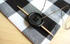 How to Sew a Sew-Through Button - How Did You Make This? | Luxe DIY